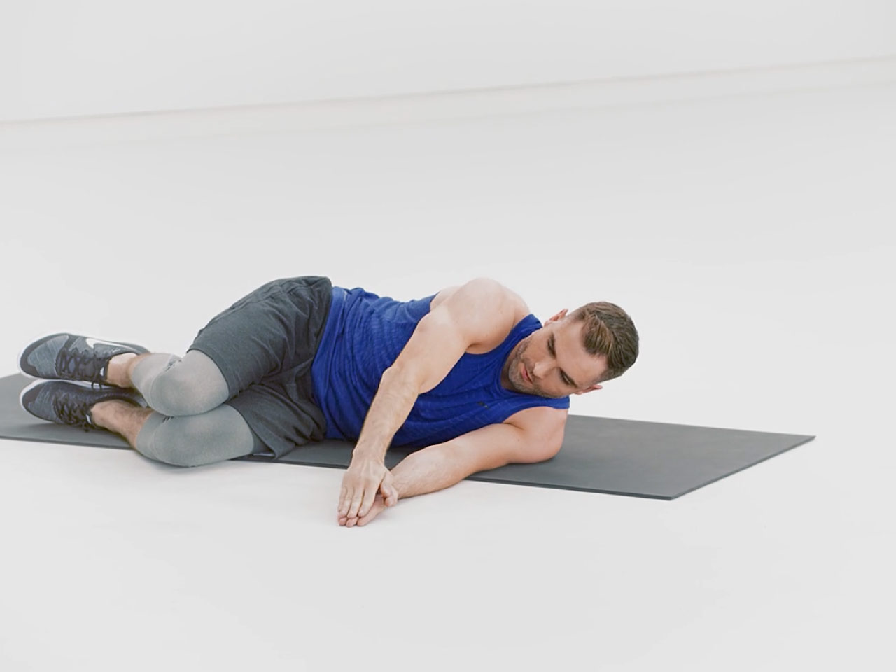 Side-Lying T-Stretch Video - Watch Proper Form, Get Tips & More ...