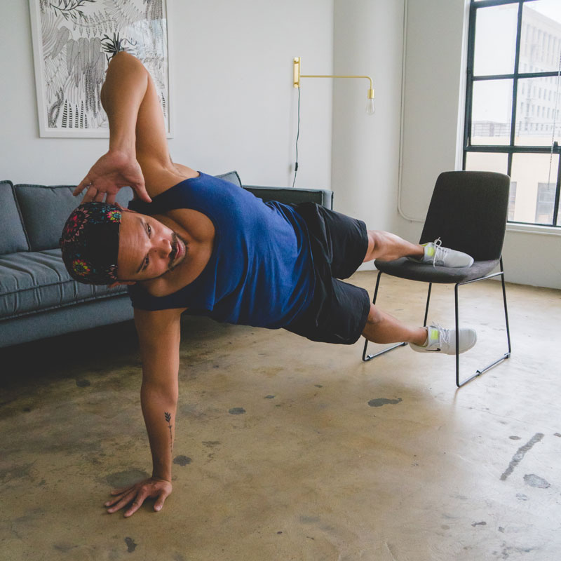 How To properly Execute The Chair Side-plank Twist | Muscle & Fitness