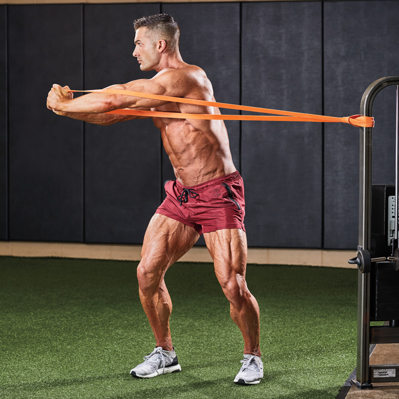 How to Do a Resistance-Band Trunk Rotation | Muscle & Fitness