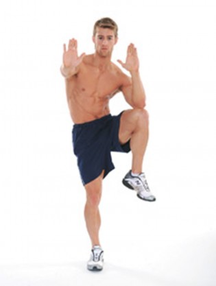 Standing Elbow-to-Knee Raise Video - Watch Proper Form, Get Tips & More ...