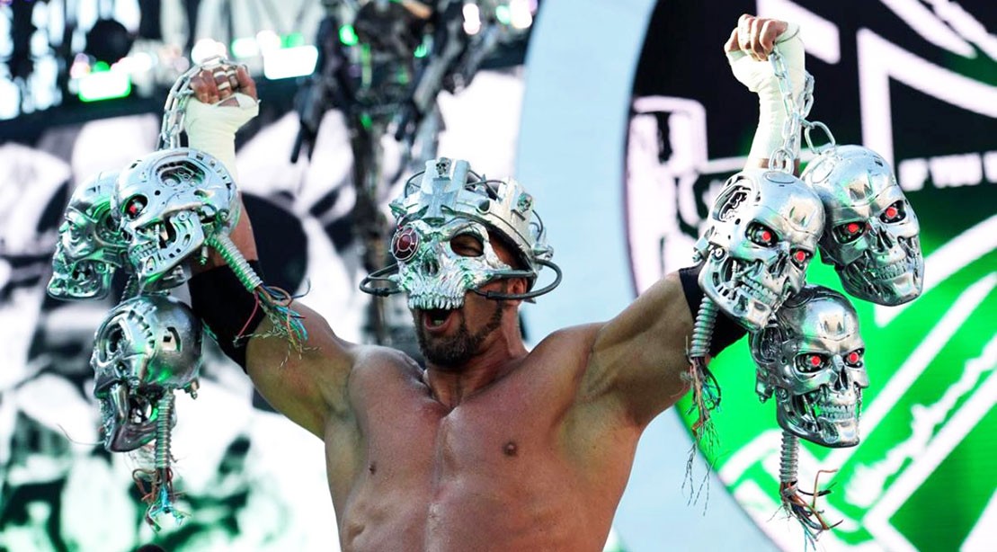 Triple H’s Top 10 WWE Moments | Muscle & Fitness