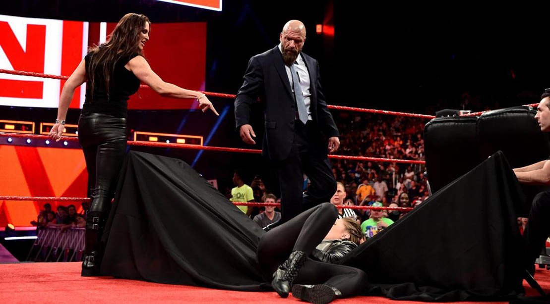 Watch: Stephanie McMahon Slams Ronda Rousey Through a Table on ‘Raw ...