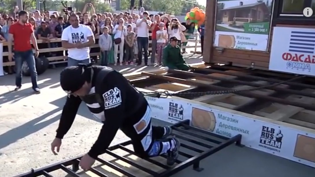 Russian Strongman Sets New World Record Pulling a House | Muscle & Fitness