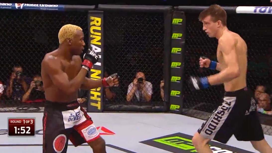 UFC Fighter Matt Dwyer KO's Opponent With Superman Punch | Muscle & Fitness