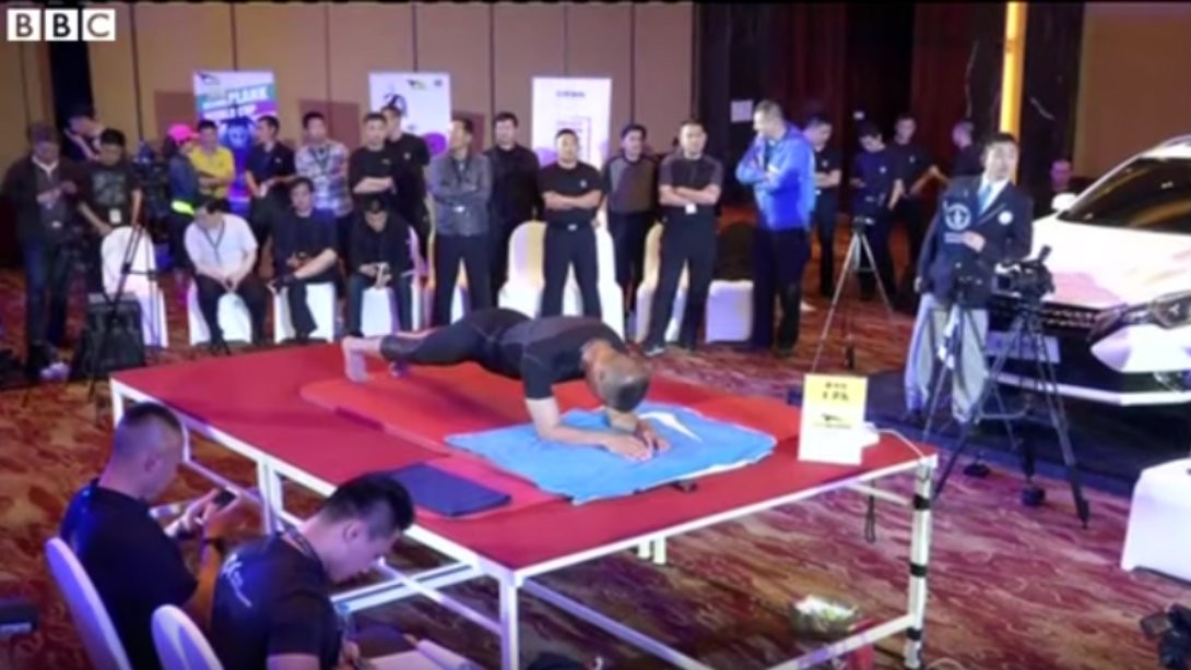 Cop Shatters Plank World Record | Muscle & Fitness